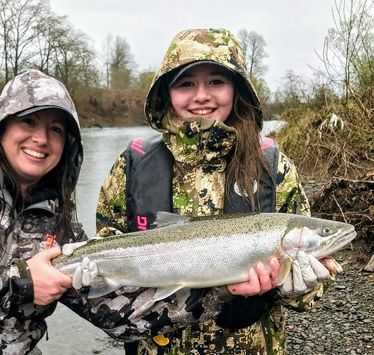 Young Girl Holding Fish | FWS.gov
