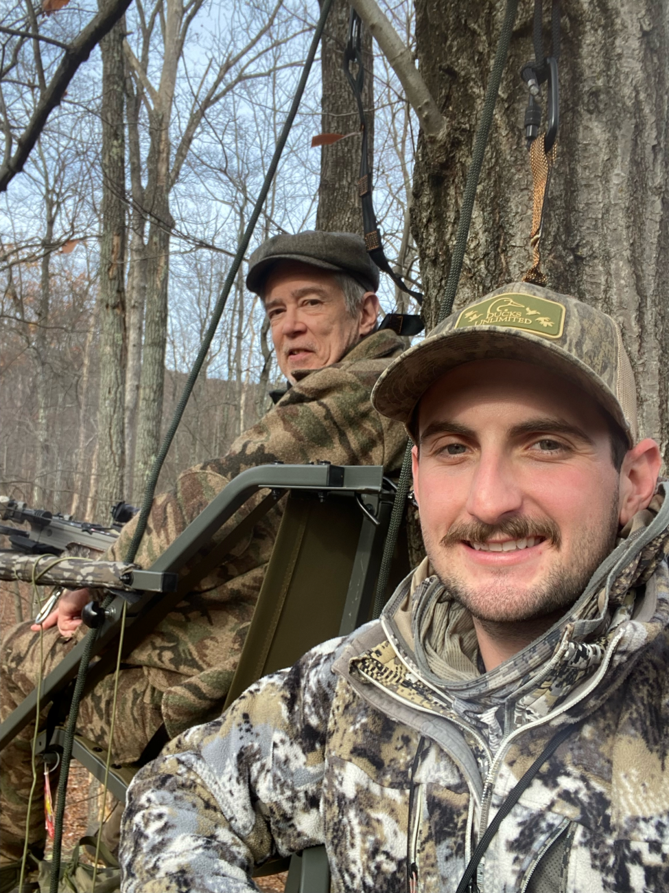Mentor Matt Falteich with his mentee Mark up in a tree stand during the ...