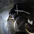 The tunnel, pipe, and valve delivering water from Snow Lakes | FWS.gov