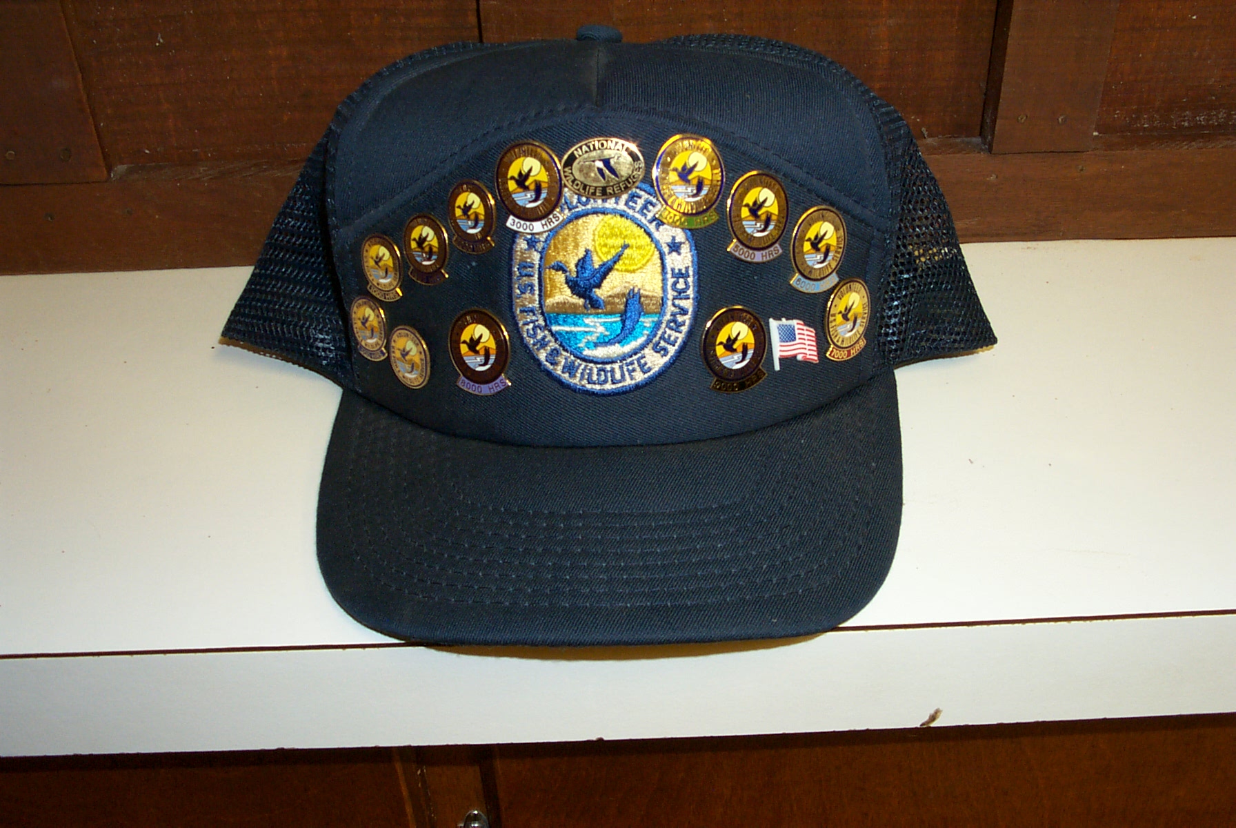 volunteer hat with pins.jpg | FWS.gov