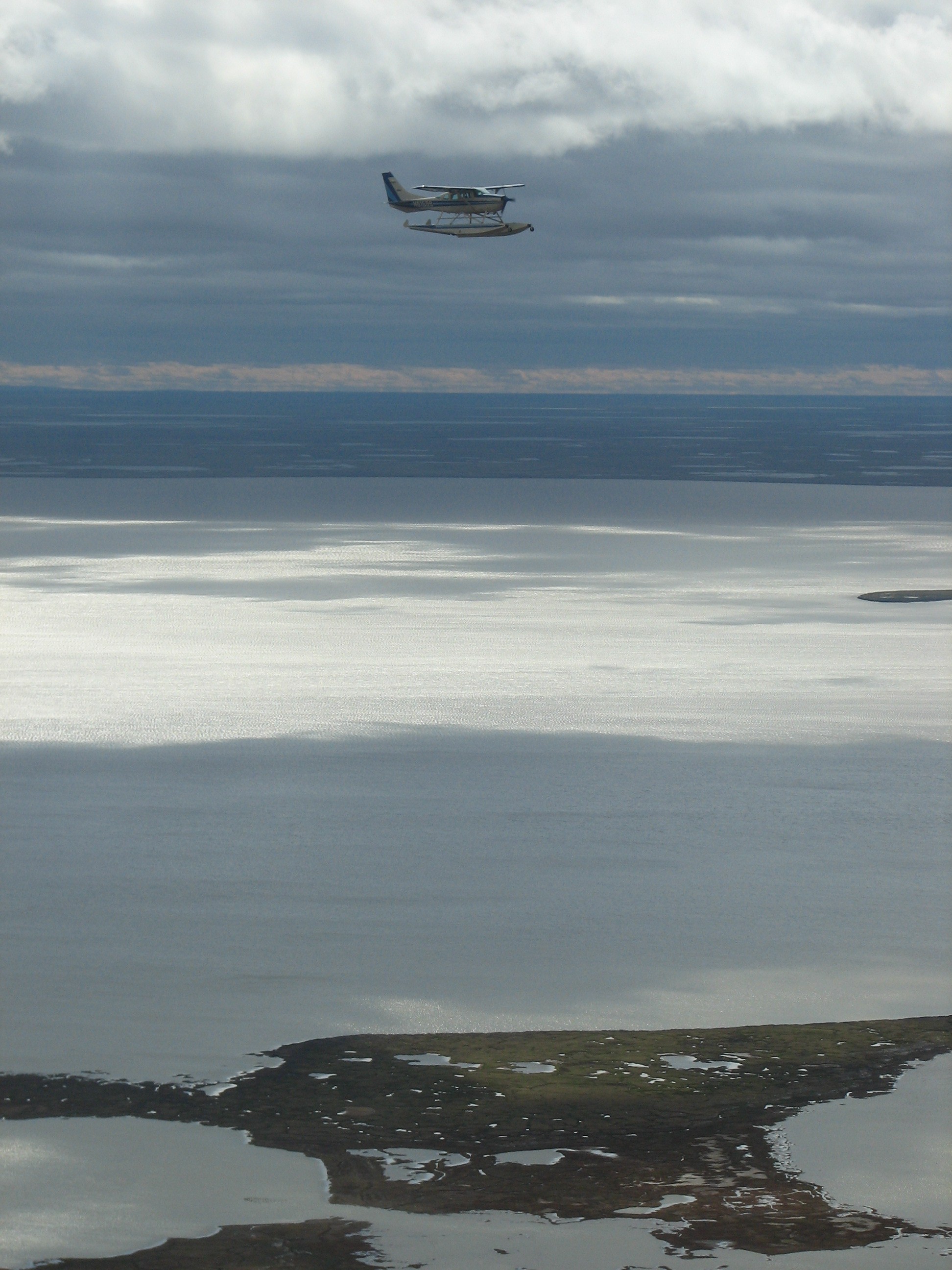 airplane flying over lake.jpg | FWS.gov
