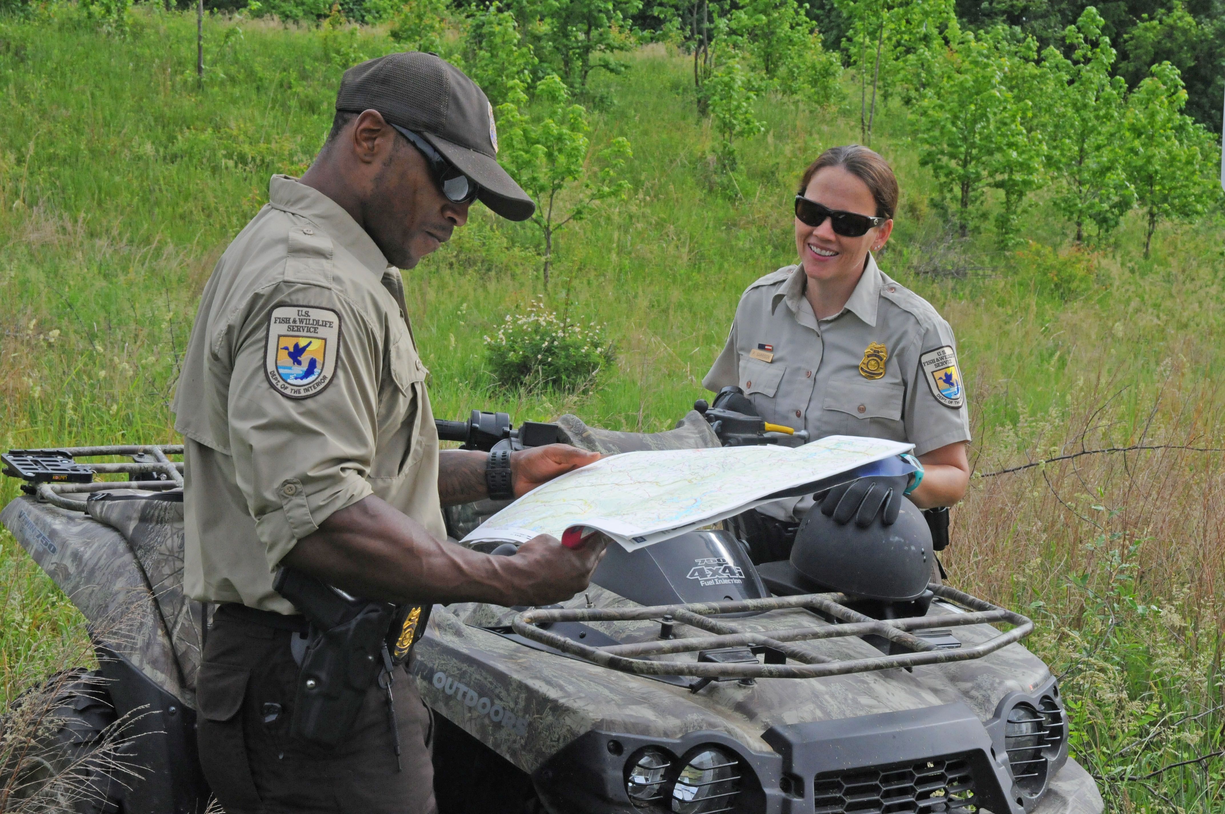 Two NWRS law enforcement officers at Patuxent Refuge | FWS.gov