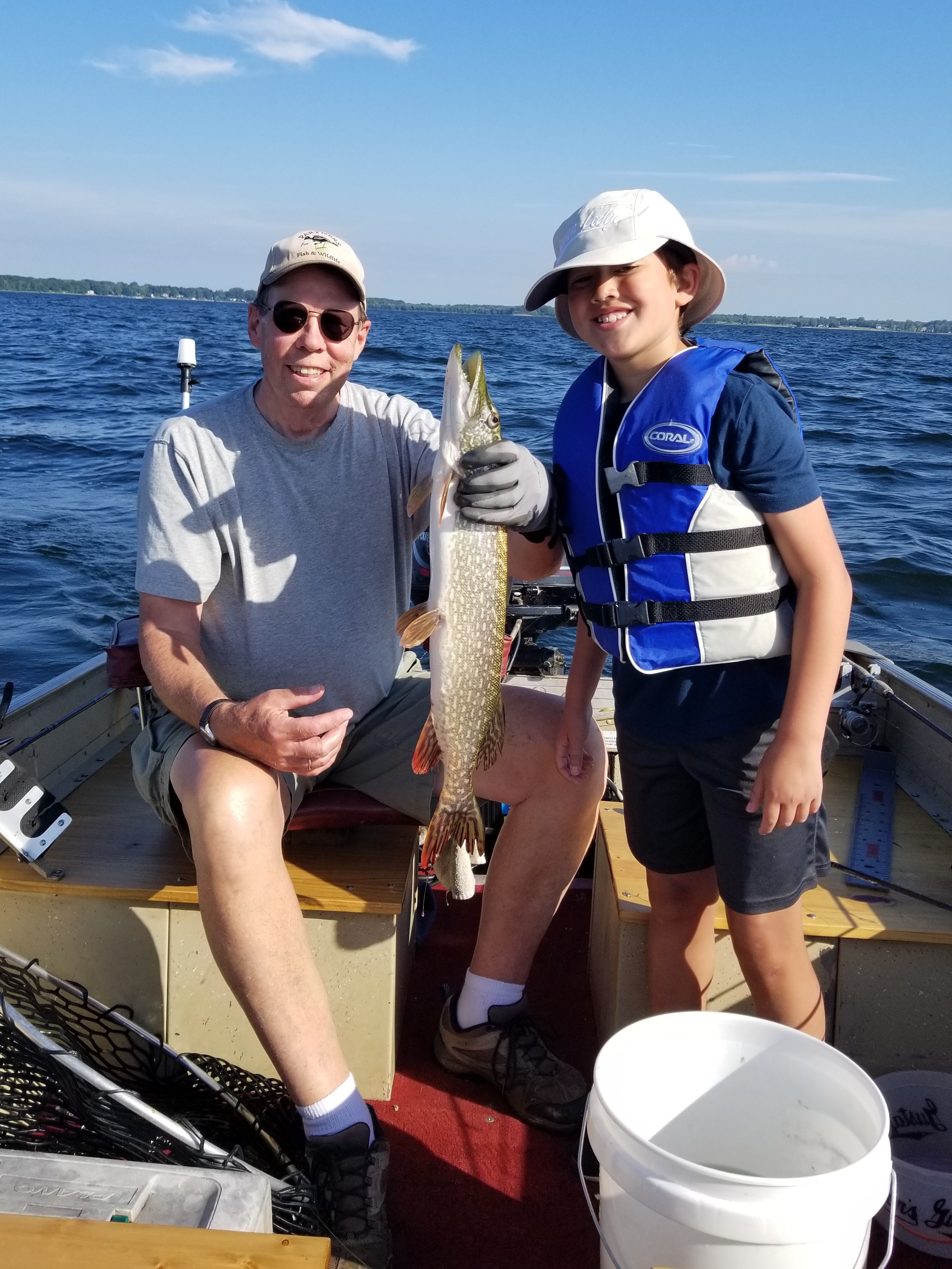 Don Hultman and grandson with northern pike | FWS.gov