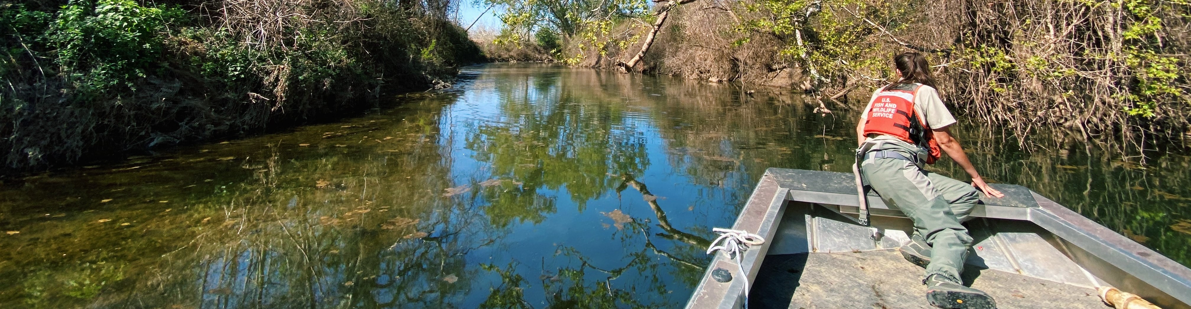 Katie on boat | FWS.gov