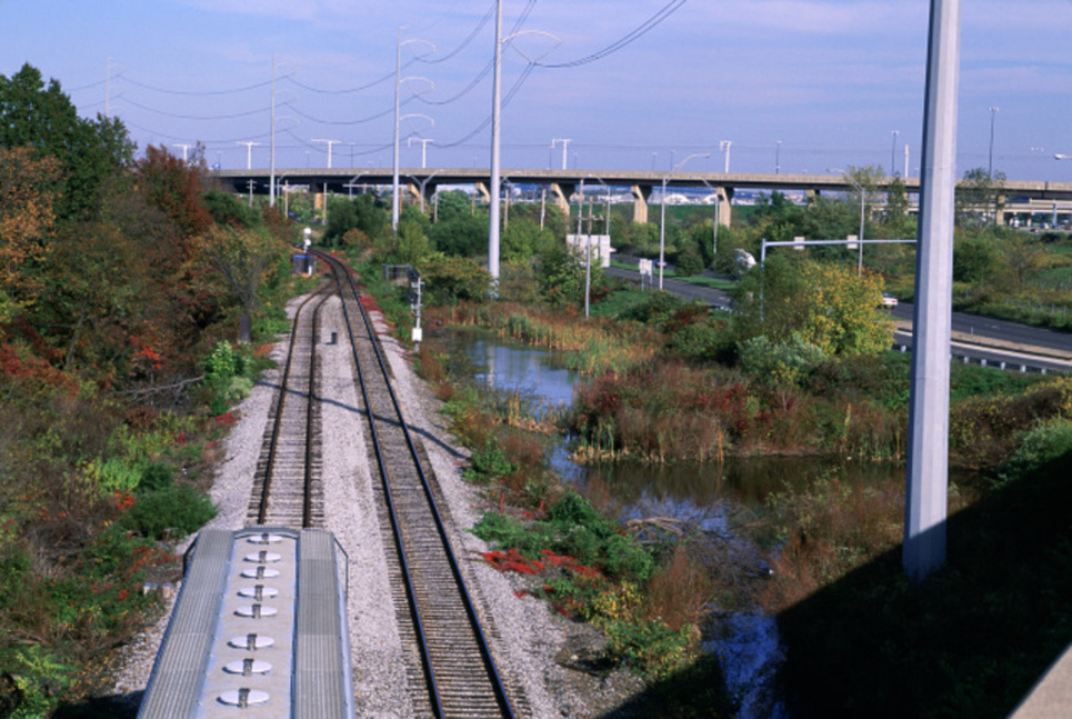 Power lines and train tracks at refuge edge | FWS.gov