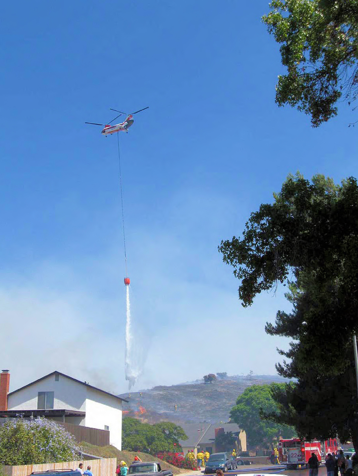 Helicopter water drop on Jamacha fire | FWS.gov