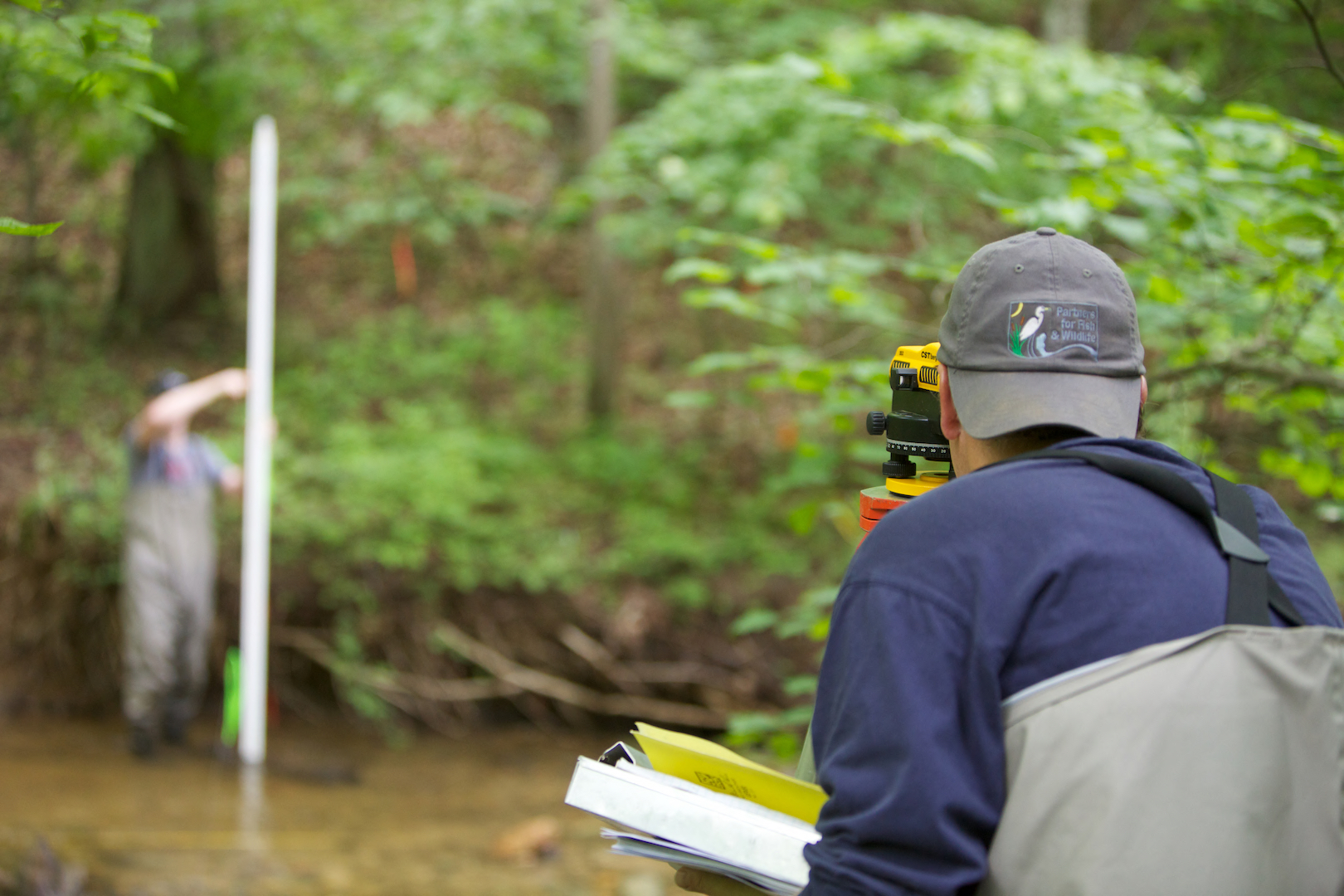 Fish and Wildlife Service employees surveying and assessing rivers and ...