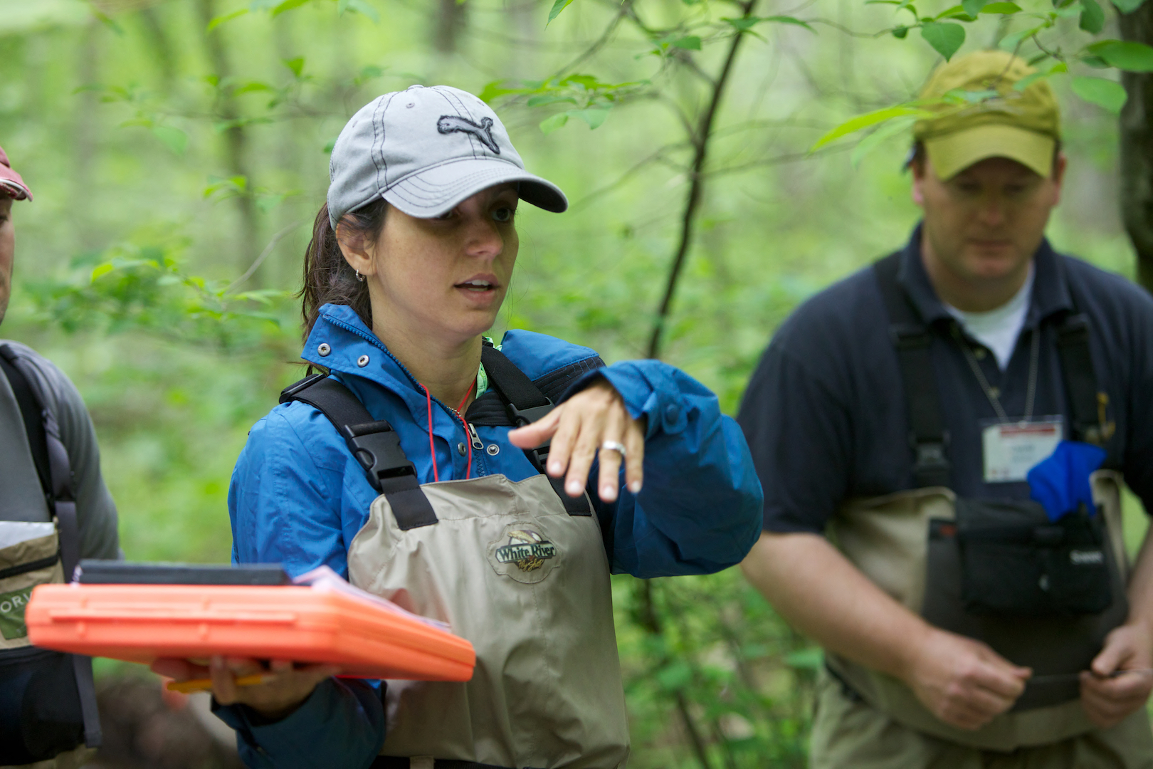 Fish and Wildlife Service employees surveying and assessing rivers and ...