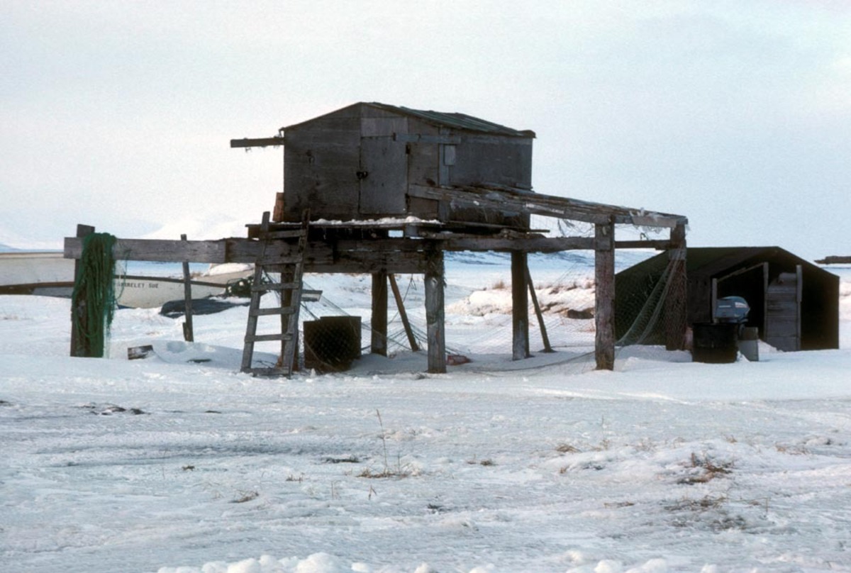 Standing Fishing Cache Near Shore | FWS.gov