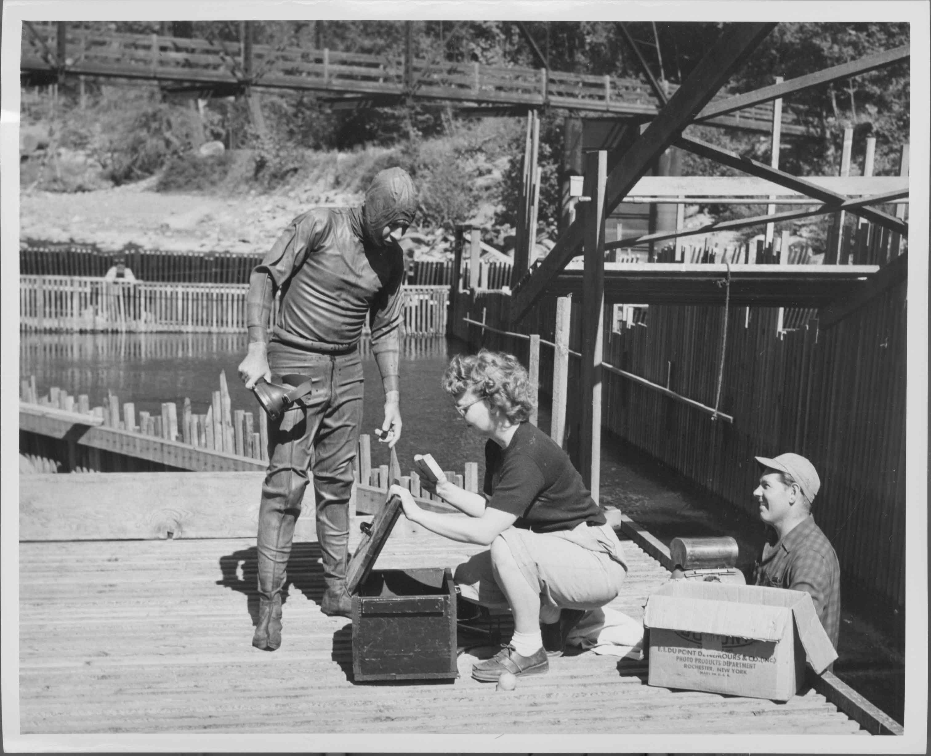 Rex Gary Schmidt gives final instructions before entering the water to ...