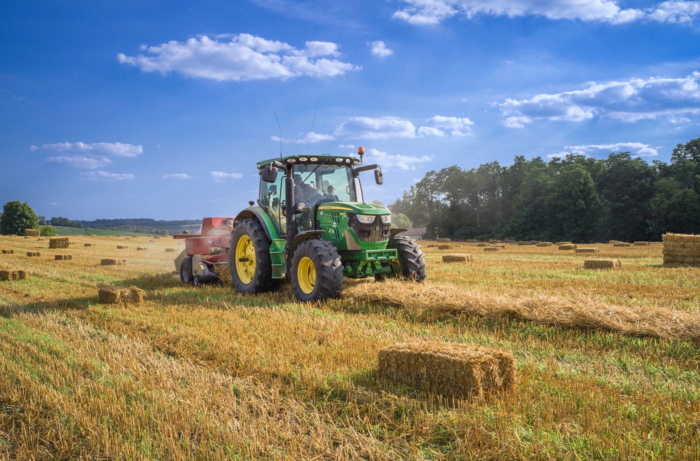 Farm tractor in hay field | FWS.gov
