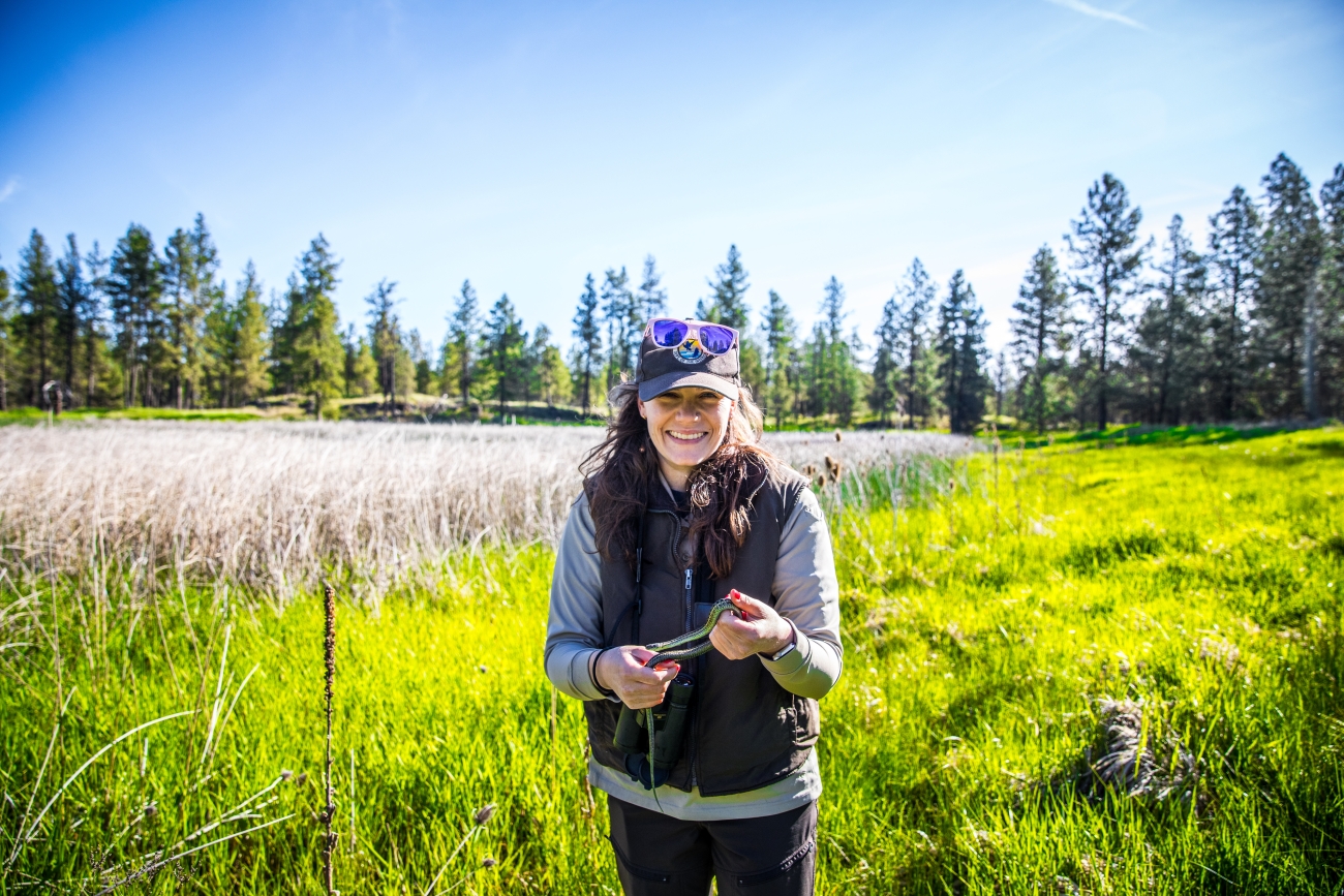 Turnbull NWR - Biologist Holding Snake | FWS.gov
