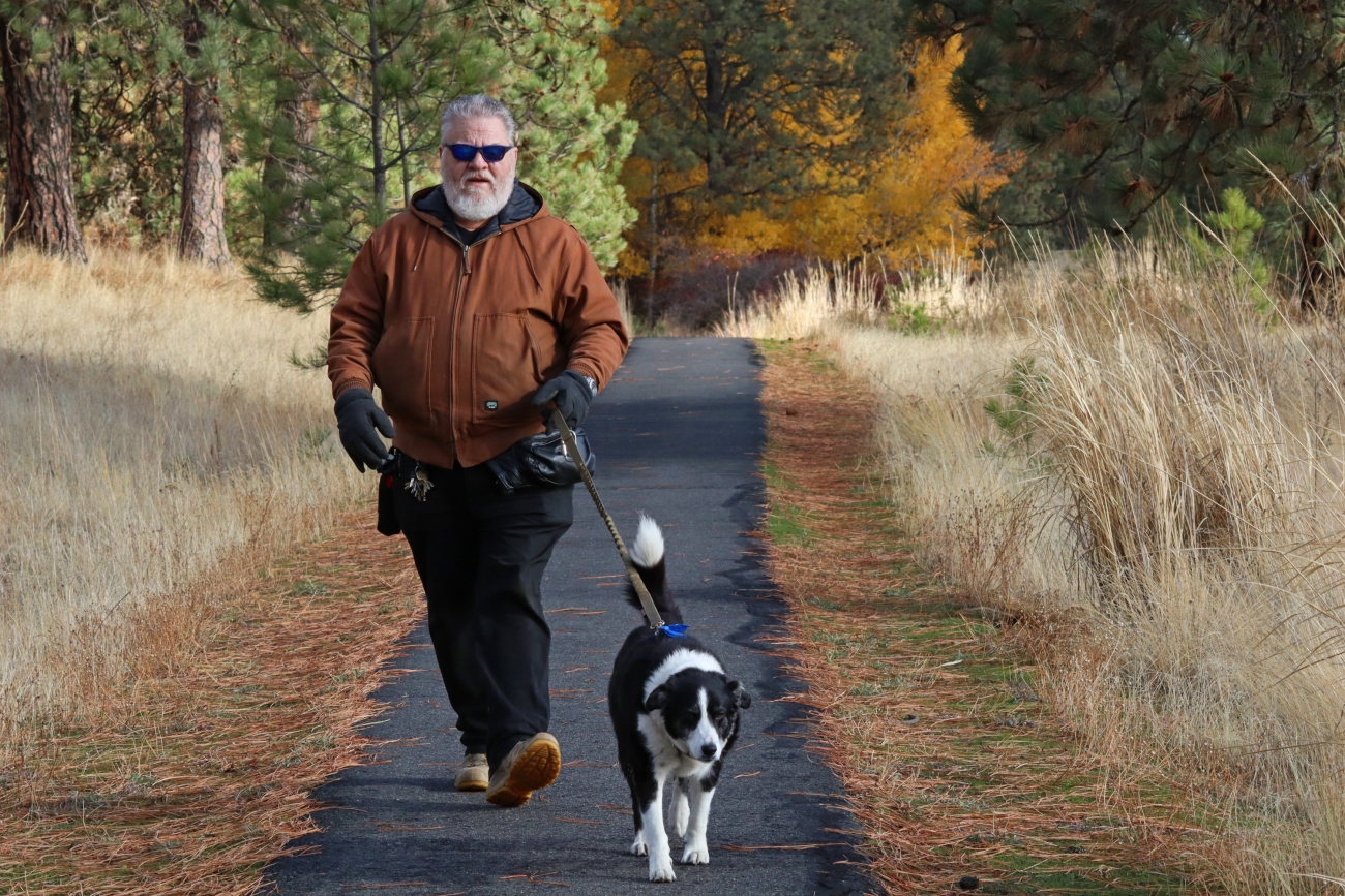 Turnbull NWR - Dog Walker on Pine Lakes Loop Trail | FWS.gov