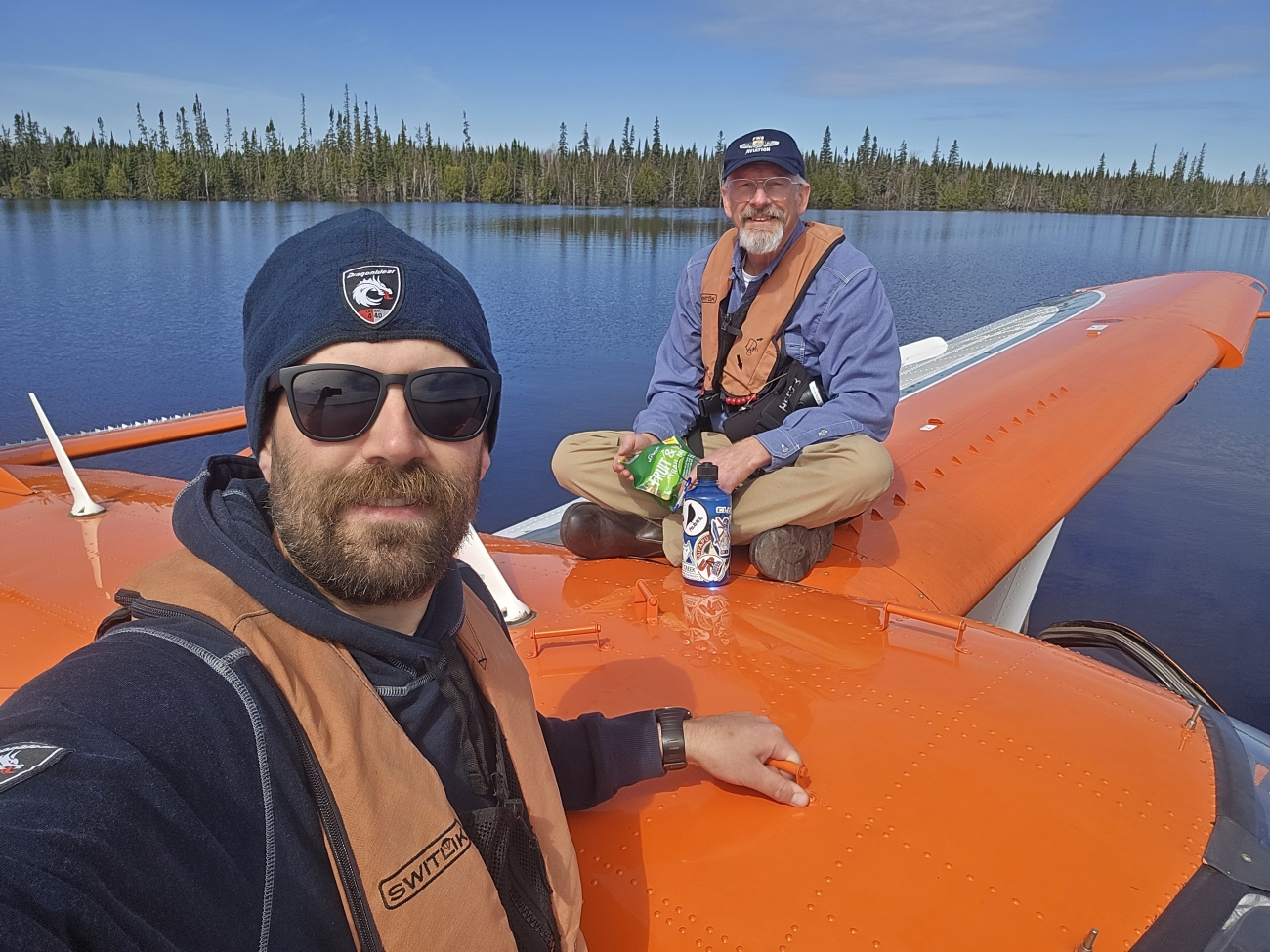 Biologist-observer Matt Weegman (left), and biologist/pilot Steve ...